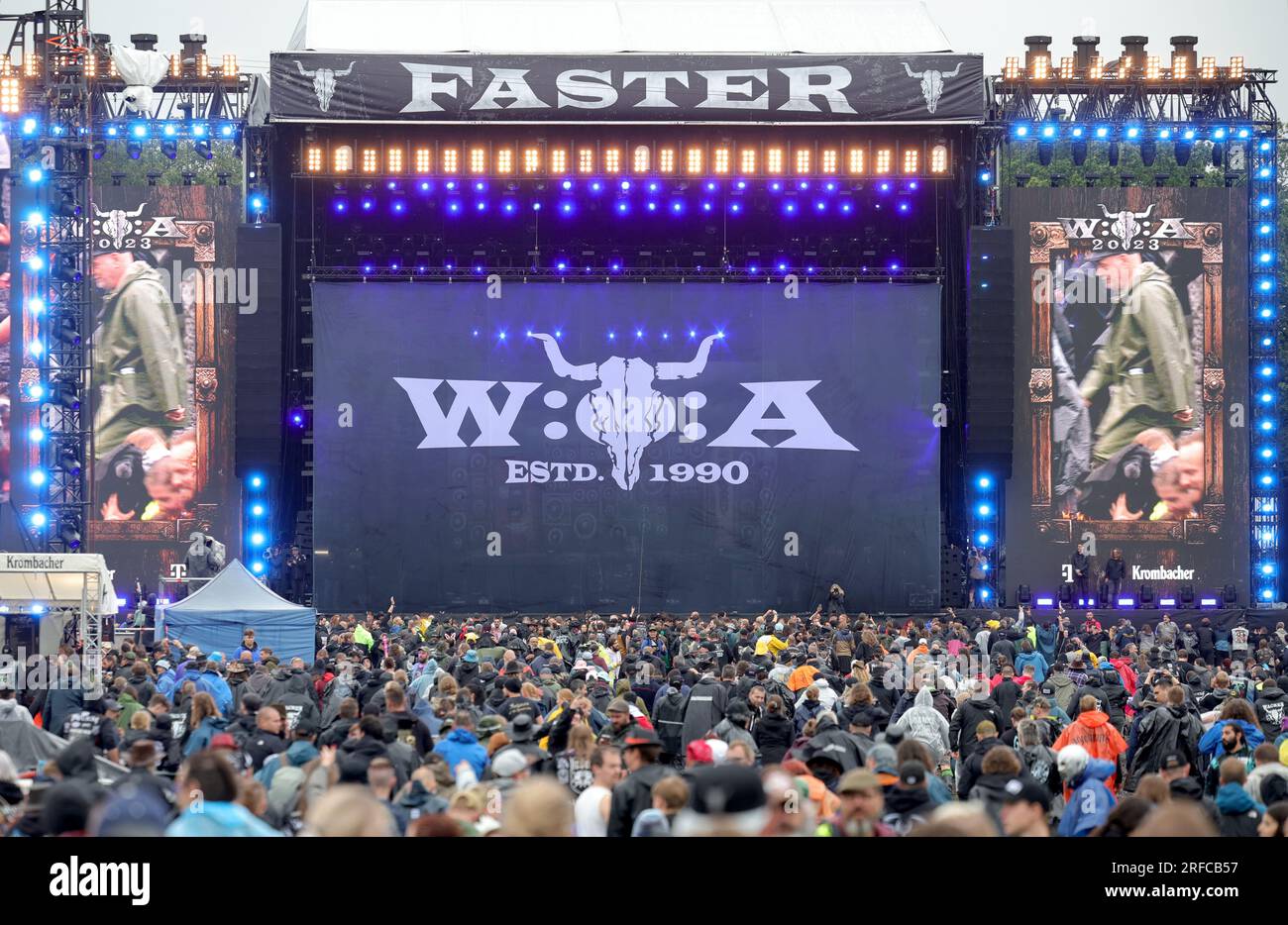Wacken, Germany. 02nd Aug, 2023. Metal fans celebrate after the opening ...