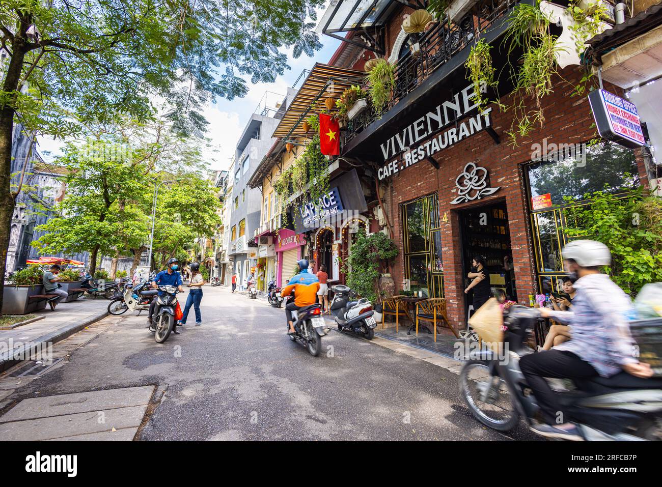 Hanoi, Vietnam - May 28, 2023: Enchanting Old town streets reveal a ...