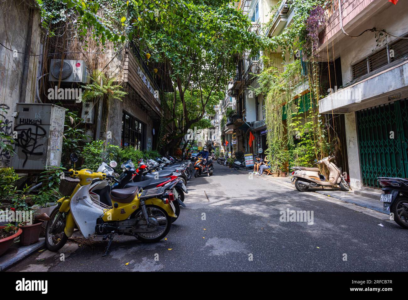 Hanoi, Vietnam - May 28, 2023: Enchanting Old town streets reveal a ...