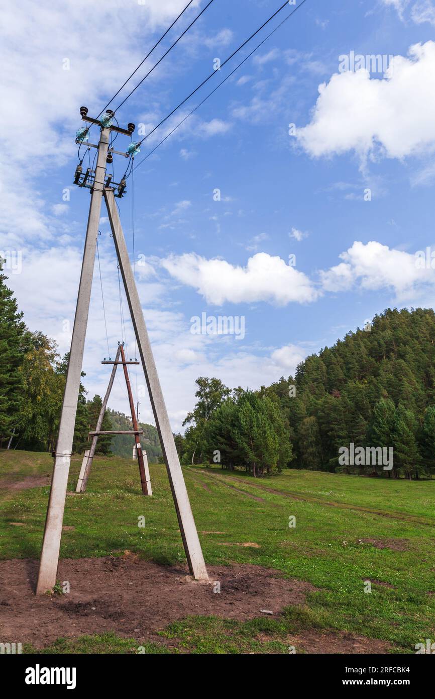 Overhead power lines, rural landscape, vertical photo Stock Photo - Alamy