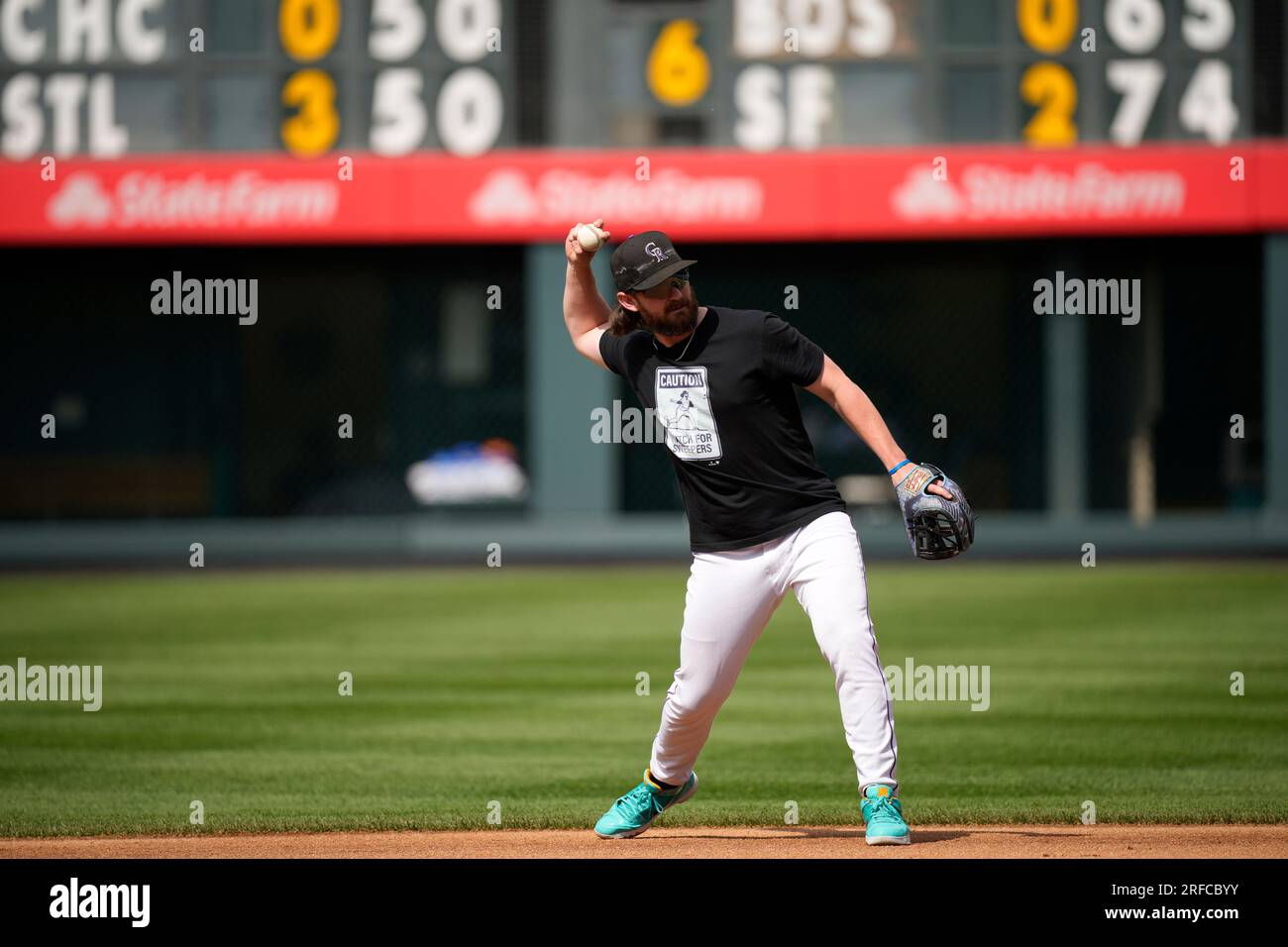 Colorado Rockies second baseman Brendan Rodgers warms up before a ...