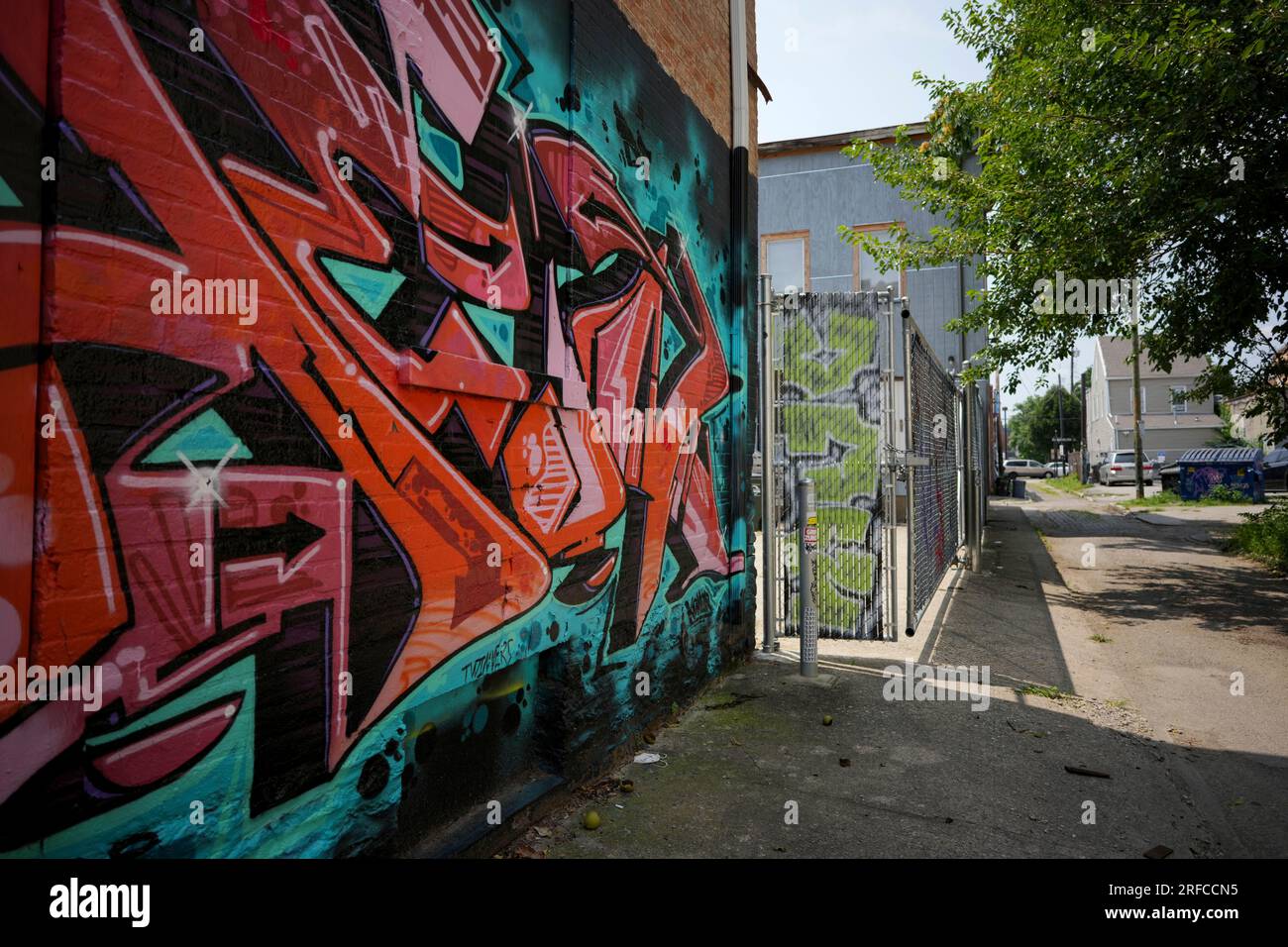 Graffiti murals are seen on the side of retail shops, Tuesday, Aug. 1 ...