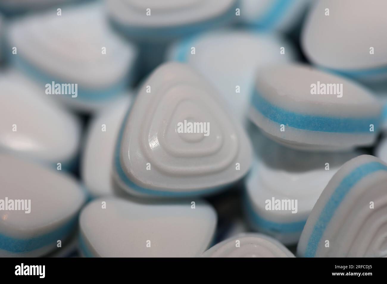 Group of sweet colorful candy light blue triangle refreshment caramel ...