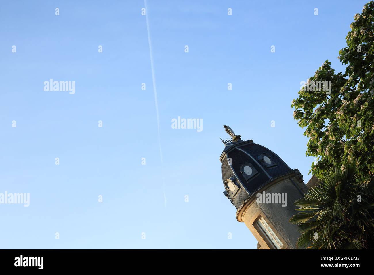 Turret and statue of Notre Dame on building at 3 Rue Vincent Ferrier ...