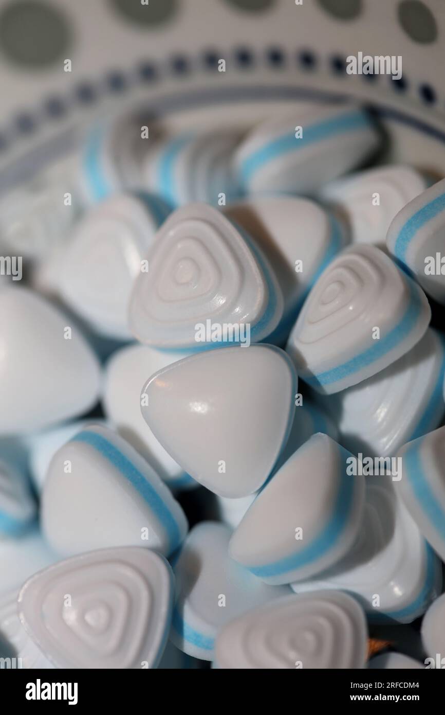 Group of sweet colorful candy light blue triangle refreshment caramel ...