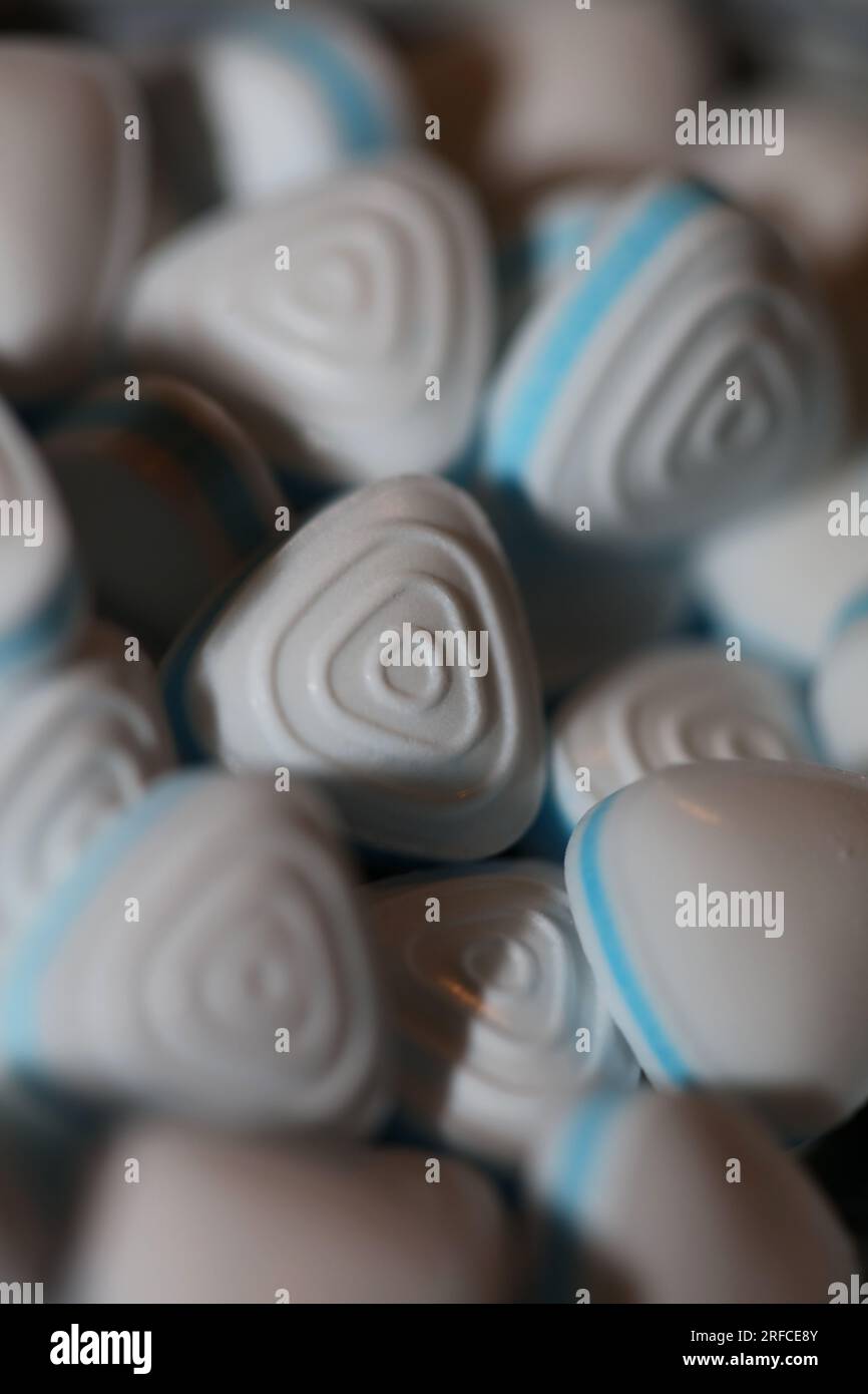 Group of sweet colorful candy light blue triangle refreshment caramel ...
