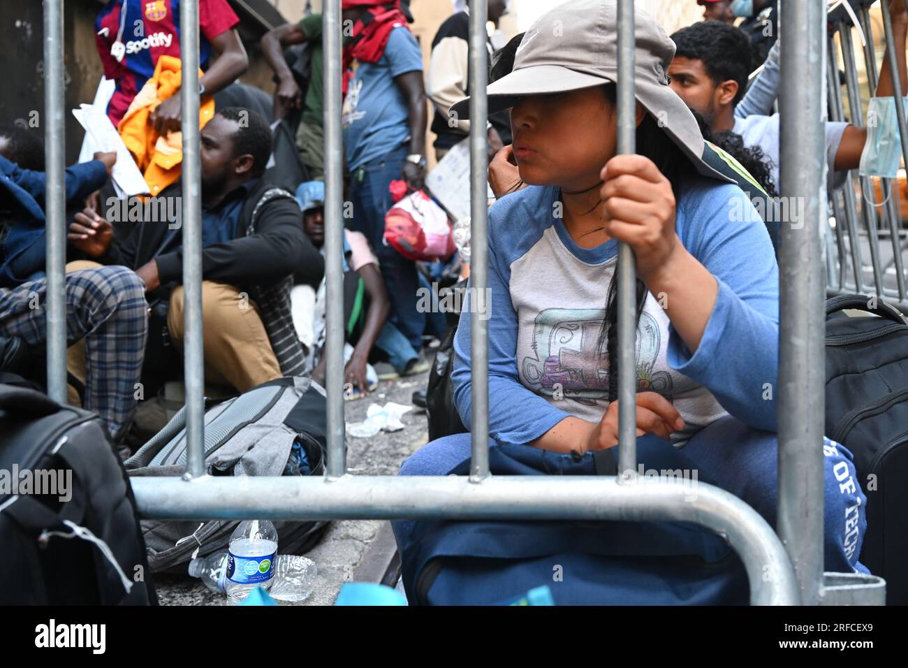 Asylum seekers camp outside the Roosevelt Hotel on the sidewalks along ...
