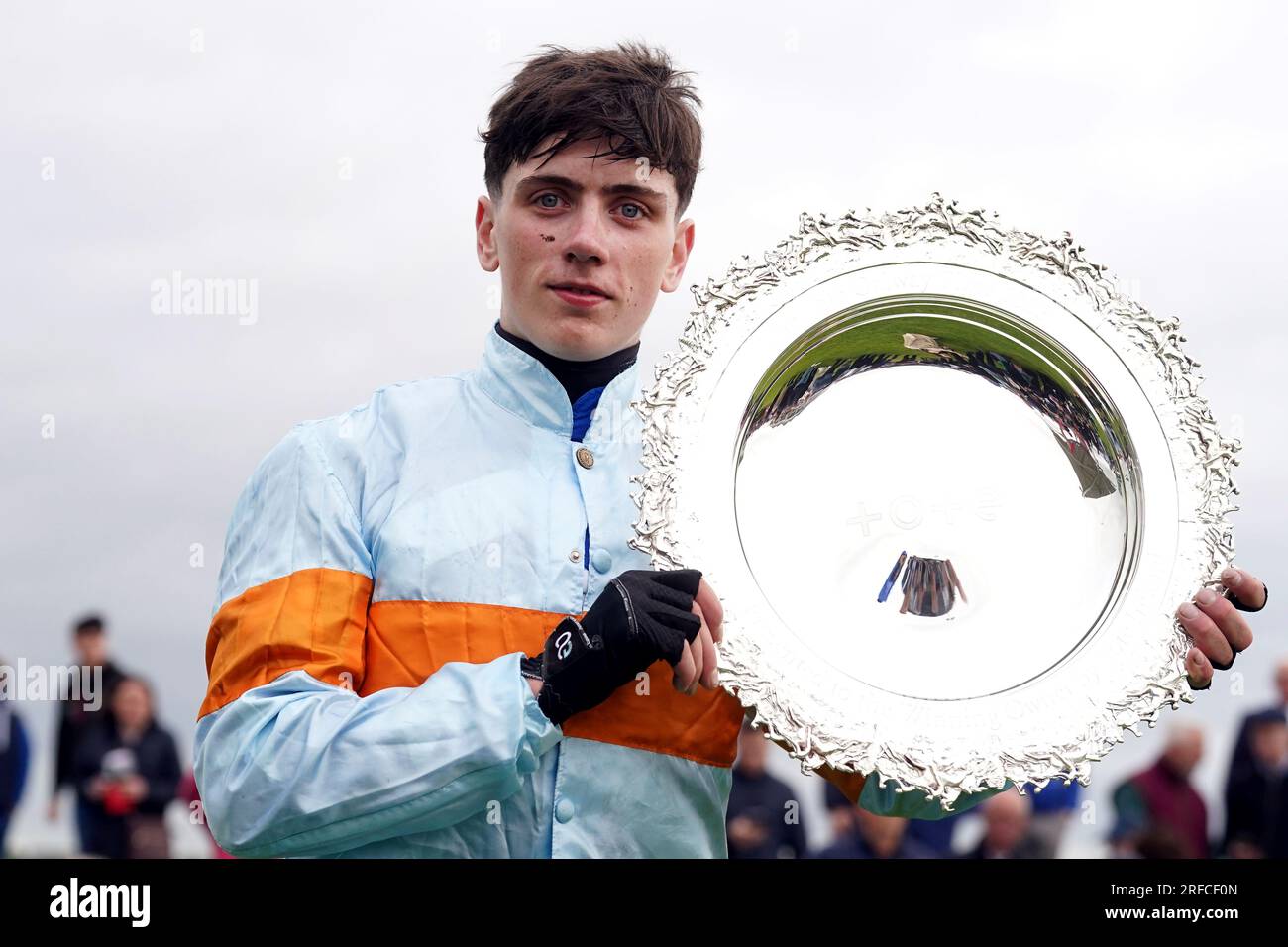 Jockey Danny Gilligan with the plate after winning the Tote Galway ...