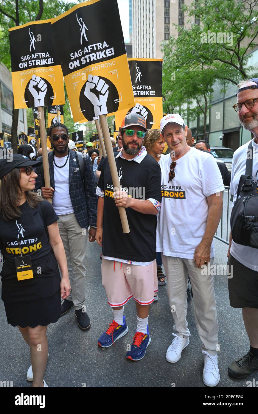 Adam Sandler walks a picket line outside NBC Studios at 30 Rockefeller ...