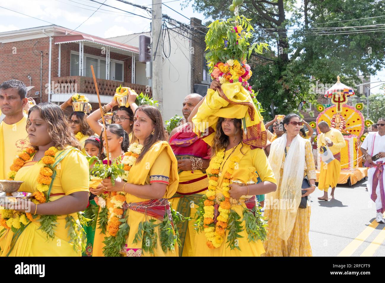 A pandita preistess marches from her temple to the site of the Thimithi ...