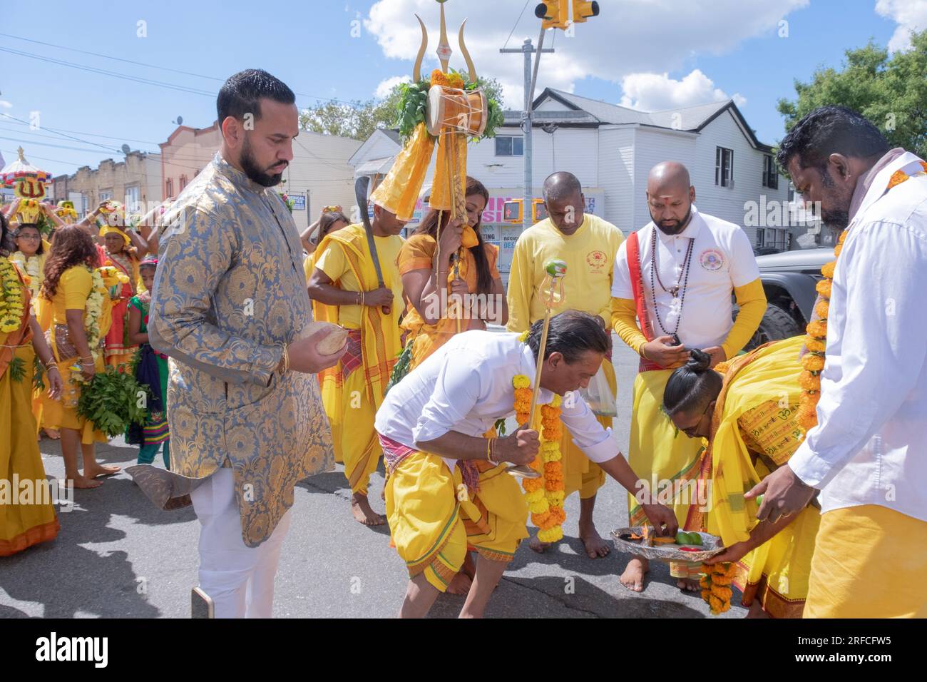A pandita preistess marches from her temple to the site of the Thimithi ...