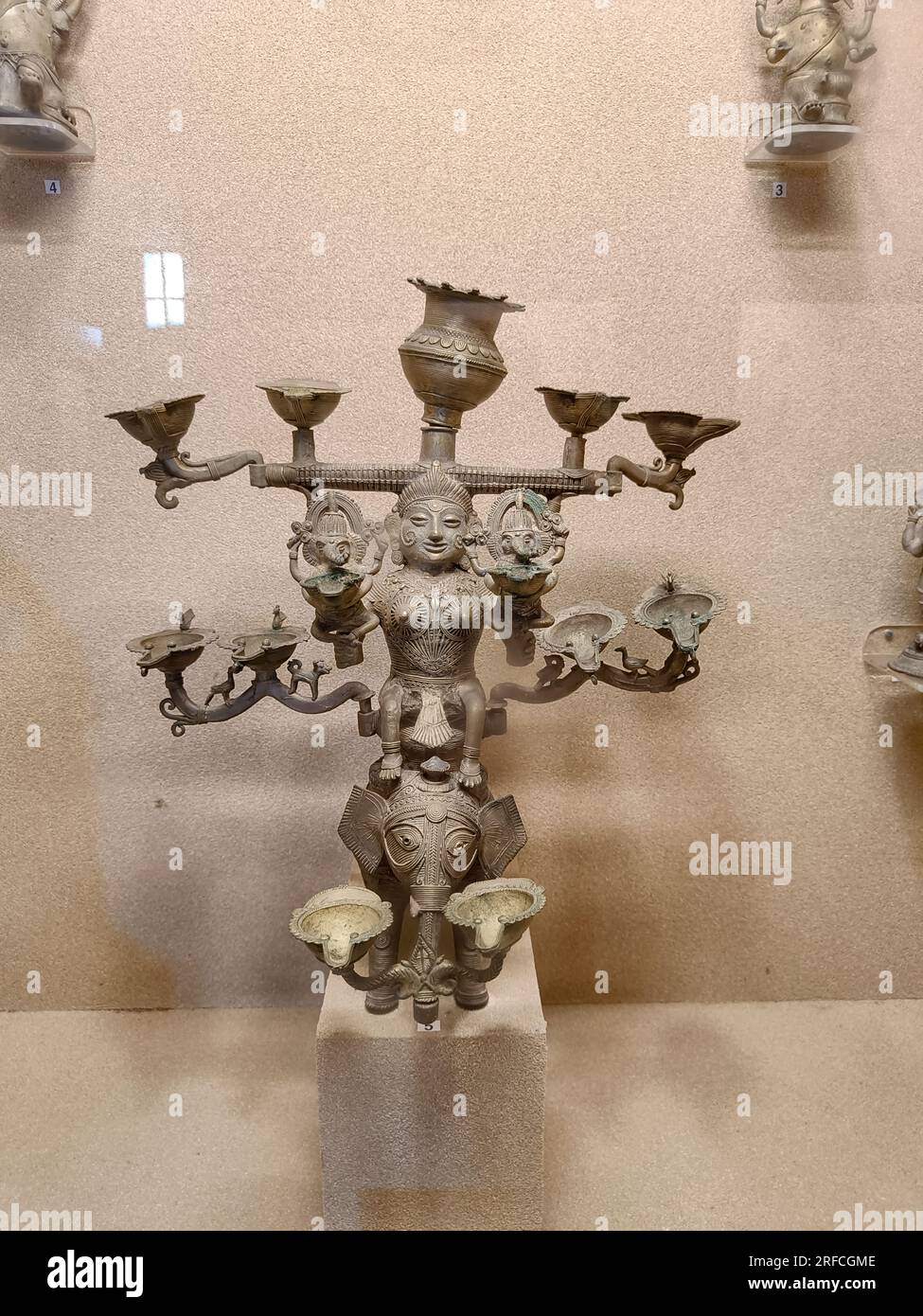 Contemporary. A brass lamp that's used for aarti (a ceremonial element ...