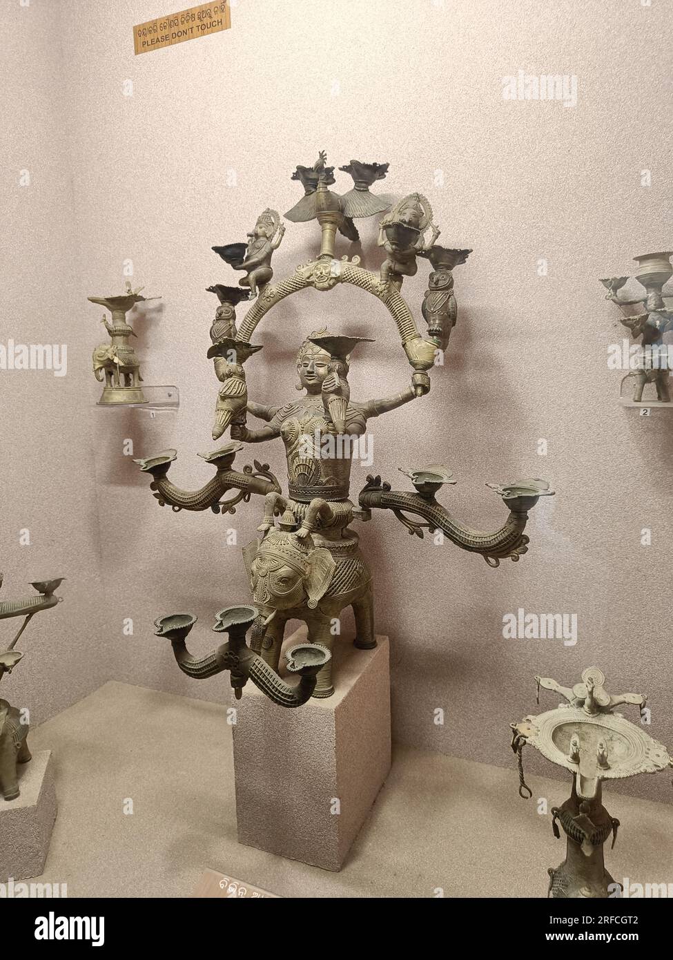 Contemporary. A brass lamp that's used for aarti (a ceremonial element ...