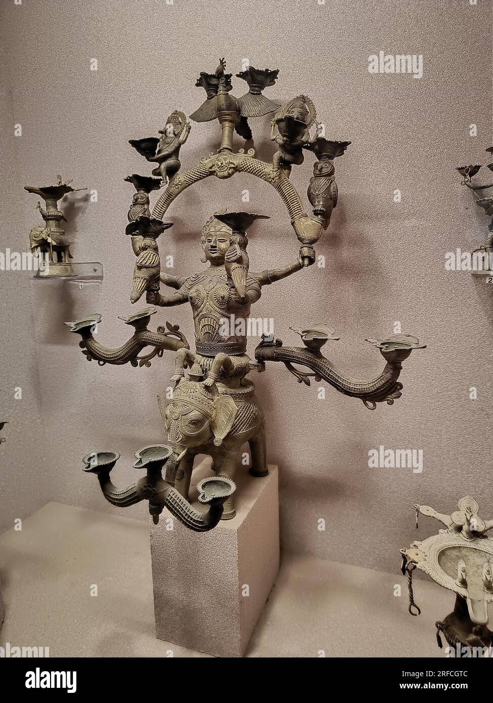 Contemporary. A brass lamp that's used for aarti (a ceremonial element ...