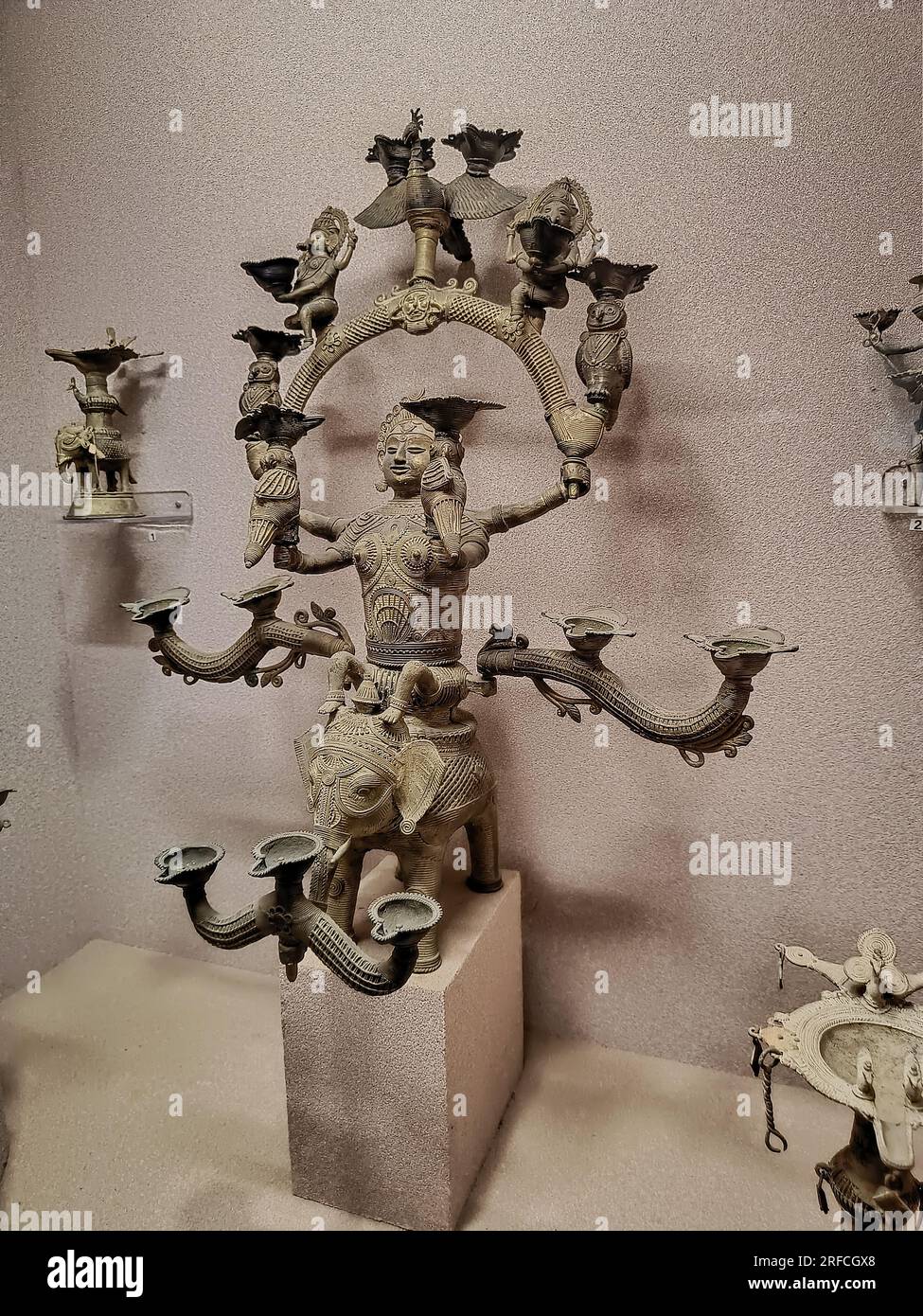 Contemporary. A brass lamp that's used for aarti (a ceremonial element ...