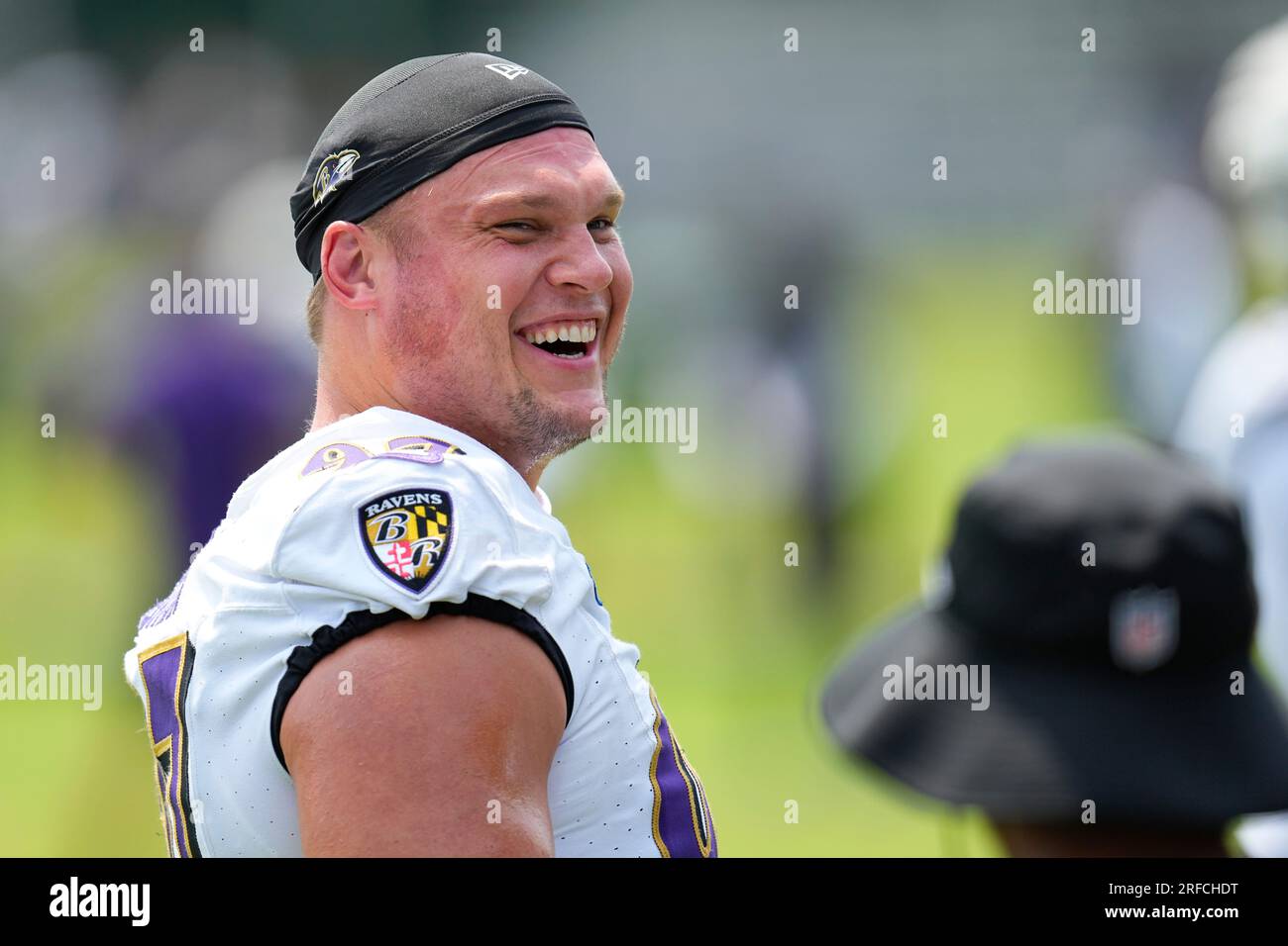 Baltimore Ravens defensive end Brent Urban reacts to fans talking to ...