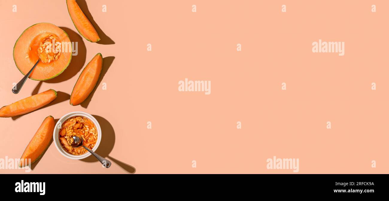 Composition with sweet cut melon on beige background with space for ...