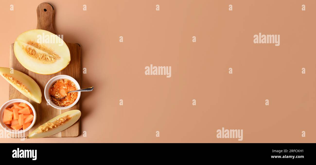 Composition with sweet cut melons on beige background with space for ...