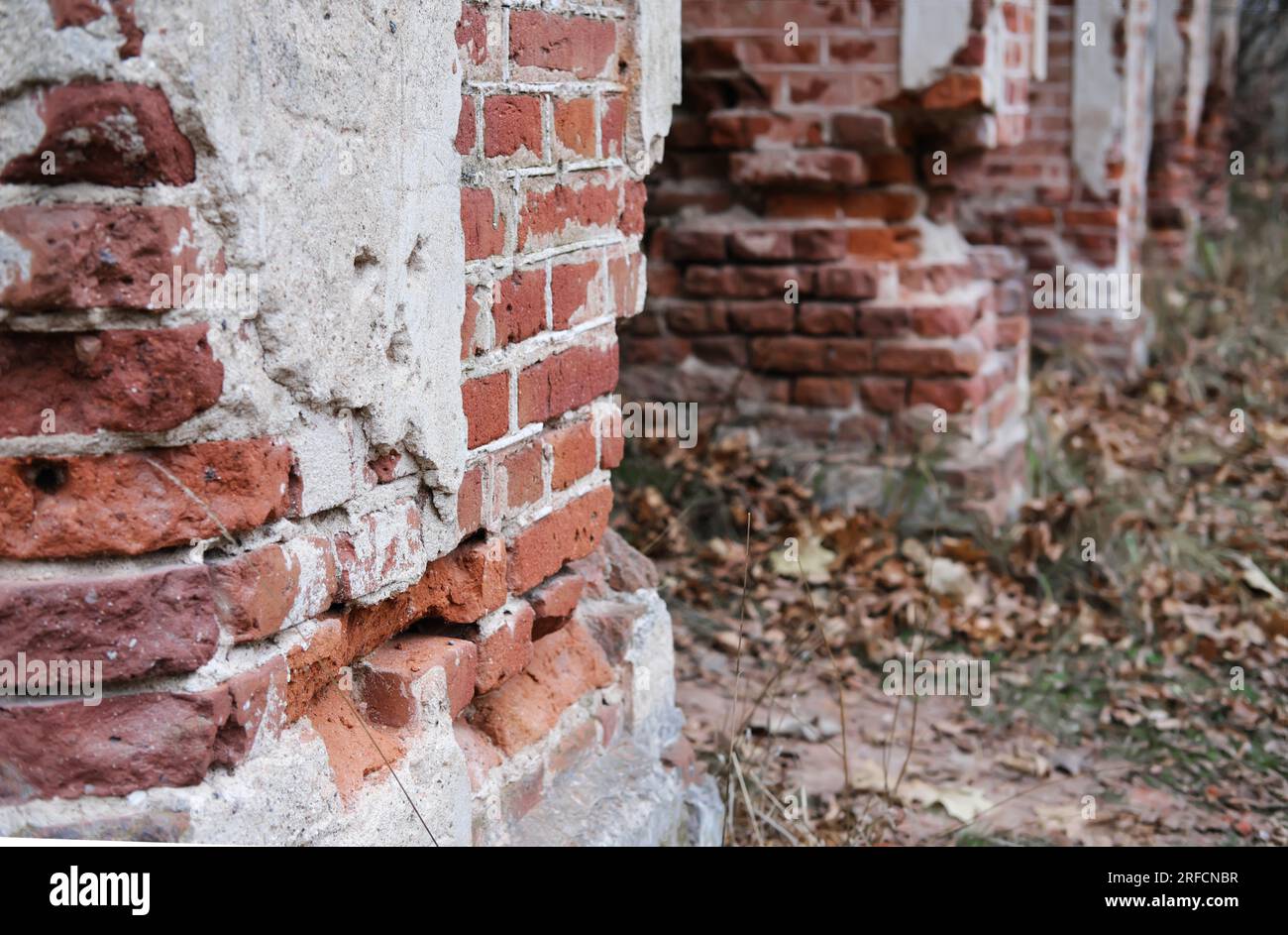Arched window openings of a destroyed abandoned building. Broken ...