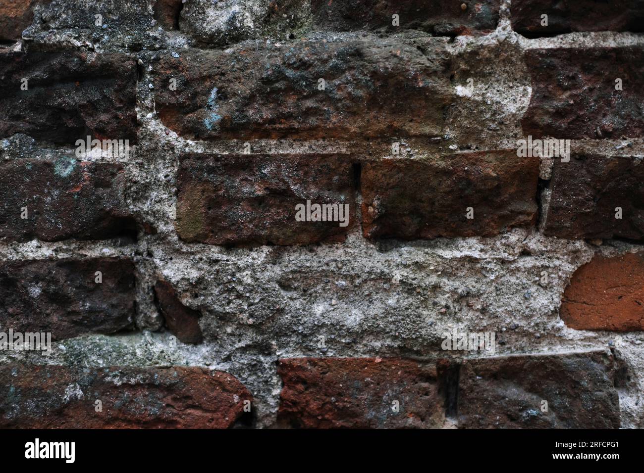 Grungy historical broken brick wall background in autumn day. Abstract ...
