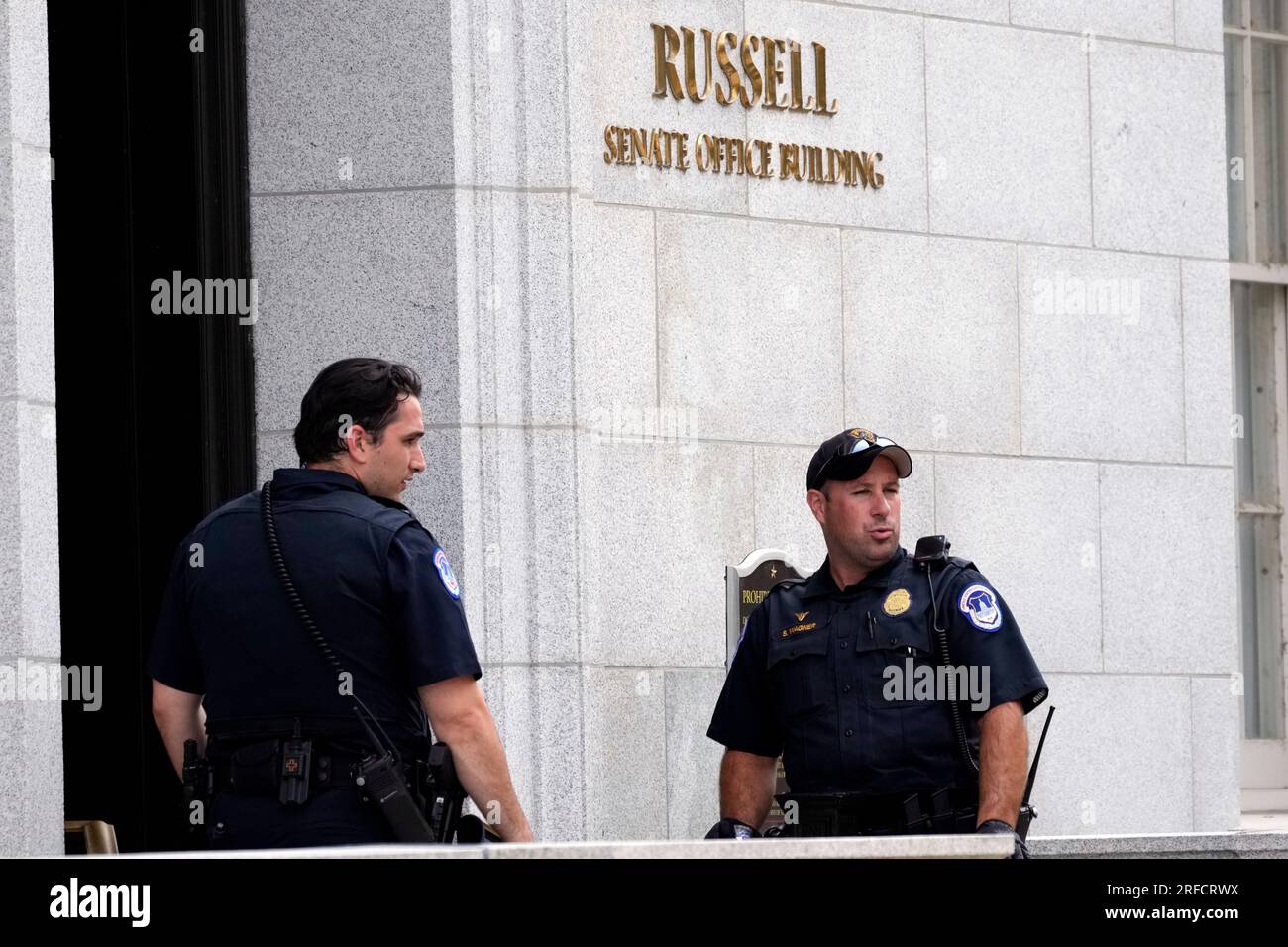 U.S. Capitol Police officers stand watch outside the Russell Senate ...