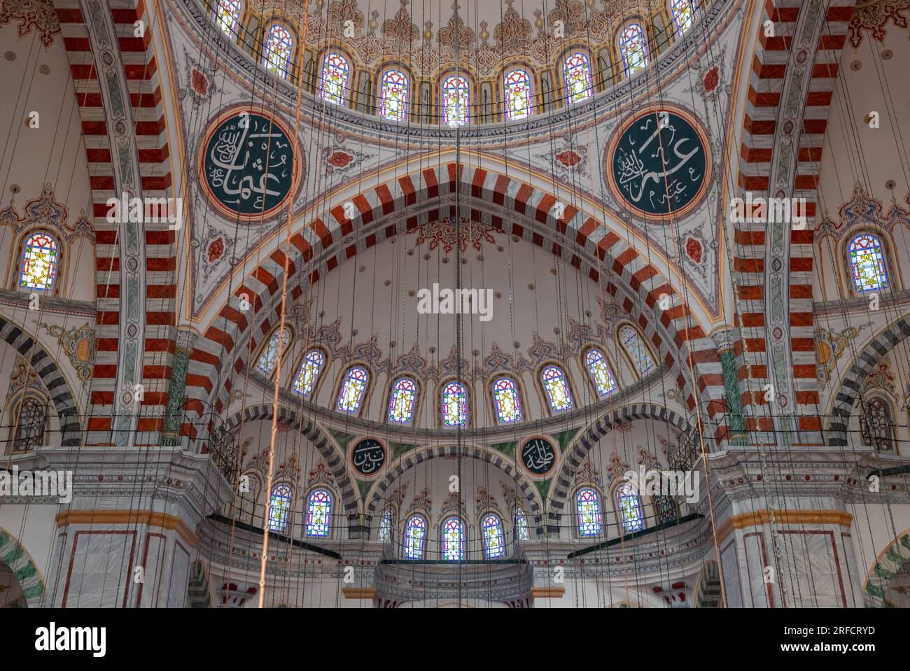 A picture of the colorful and gorgeous interior of the Fatih Mosque, in ...