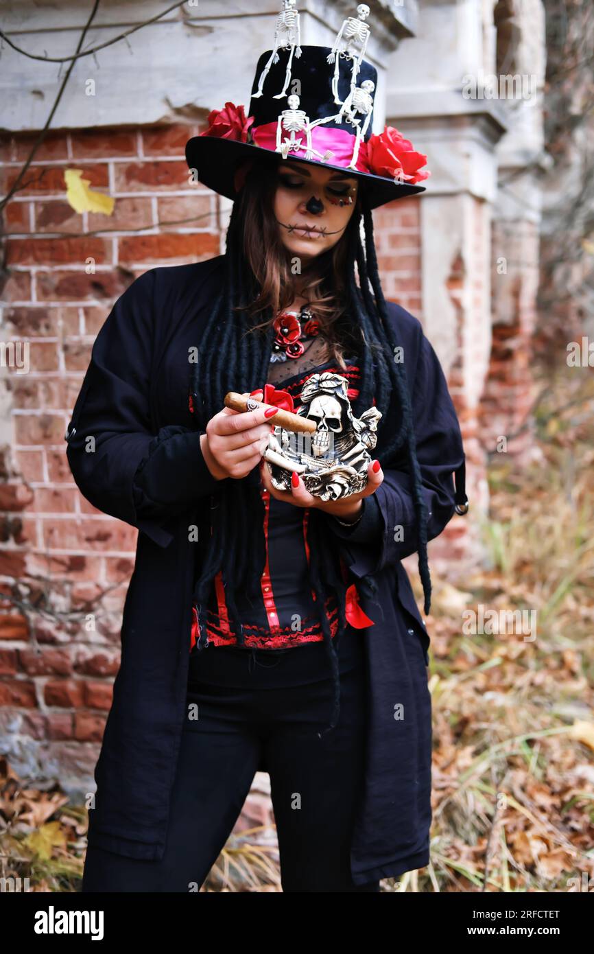 A woman in the image of Baron Saturday. The model is dressed in a ...