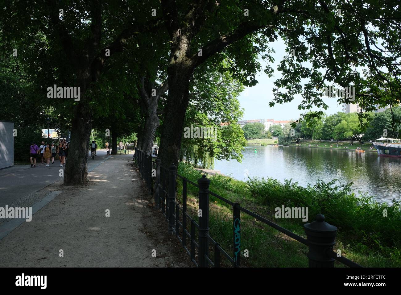 Berlin, Germany, July 11, 2023, riverside walkway at Urbanhafen harbor ...