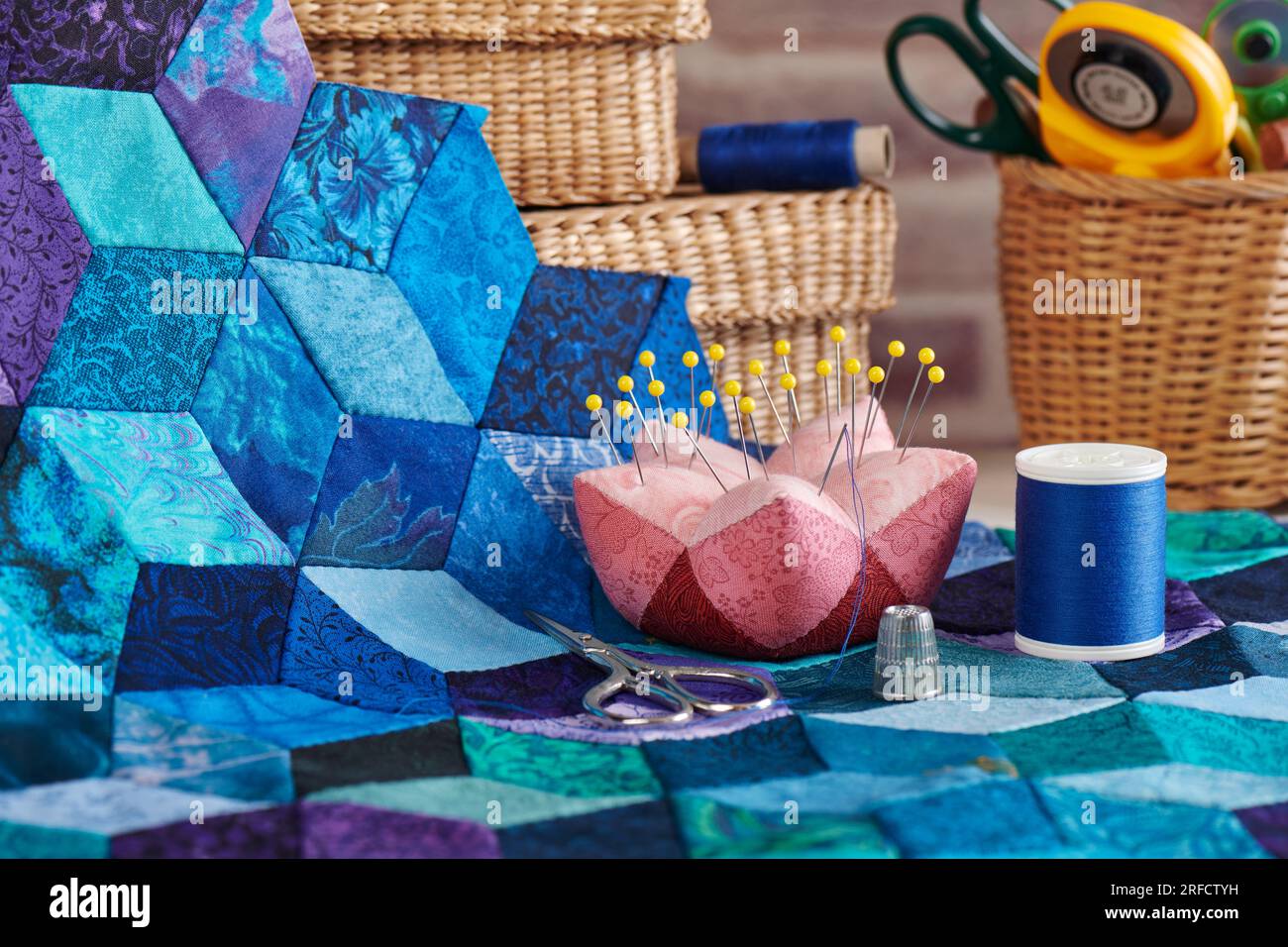 Accessories for sewing, fragment of tumbling blocks quilt and baskets ...