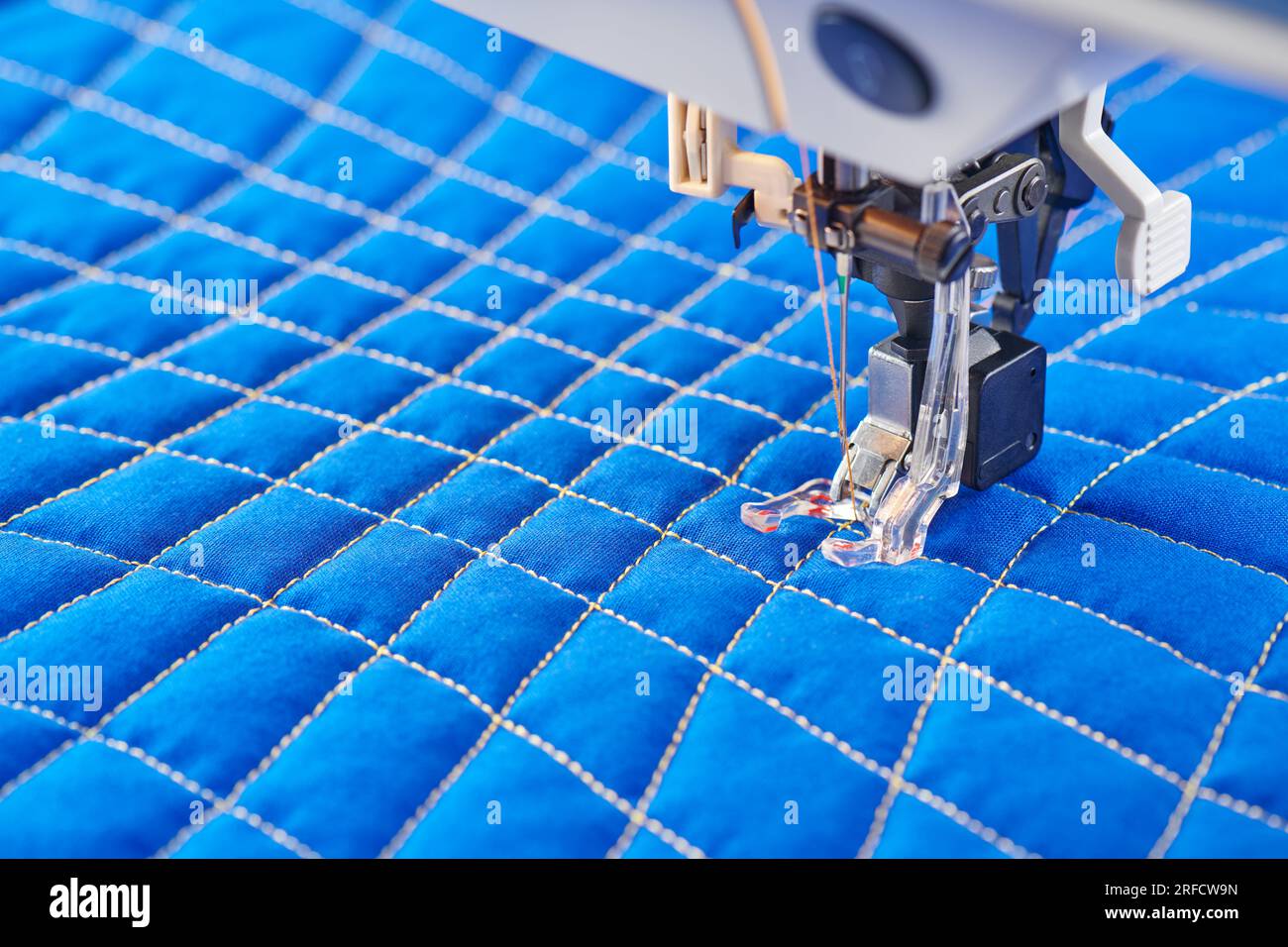 Process quilting with an electric sewing machine by using a free-motion ...