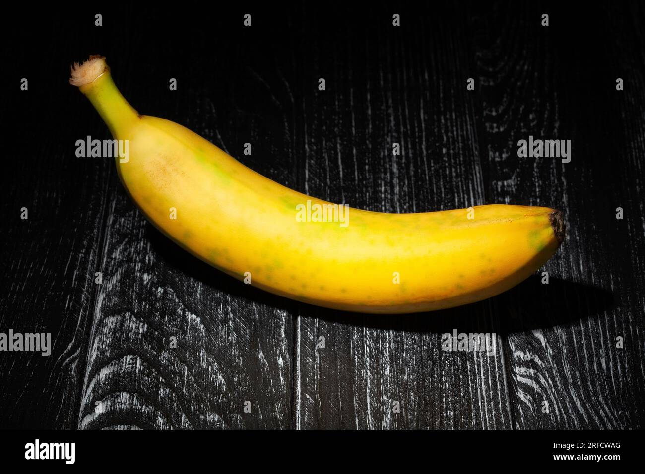 Banana single black hi-res stock photography and images - Alamy