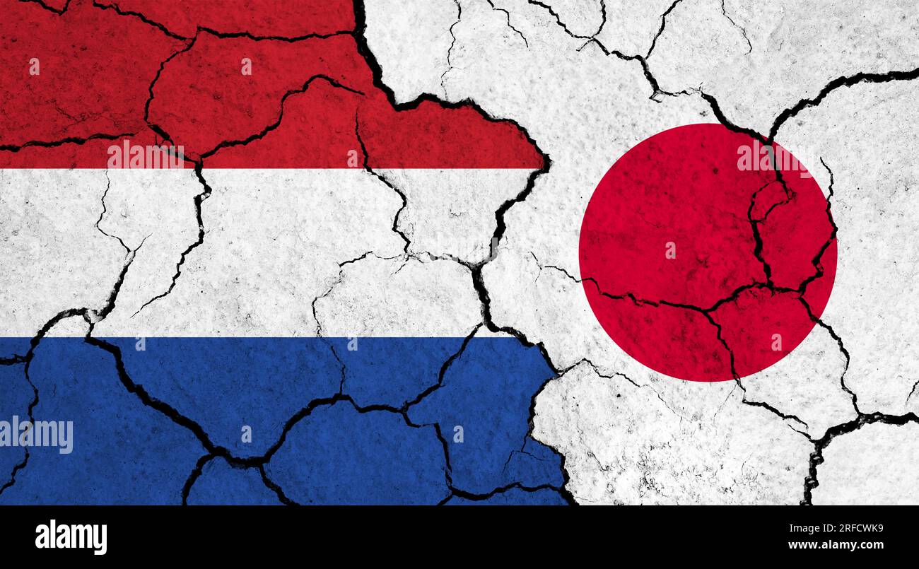 Flags of Netherlands and Japan on cracked surface - politics ...