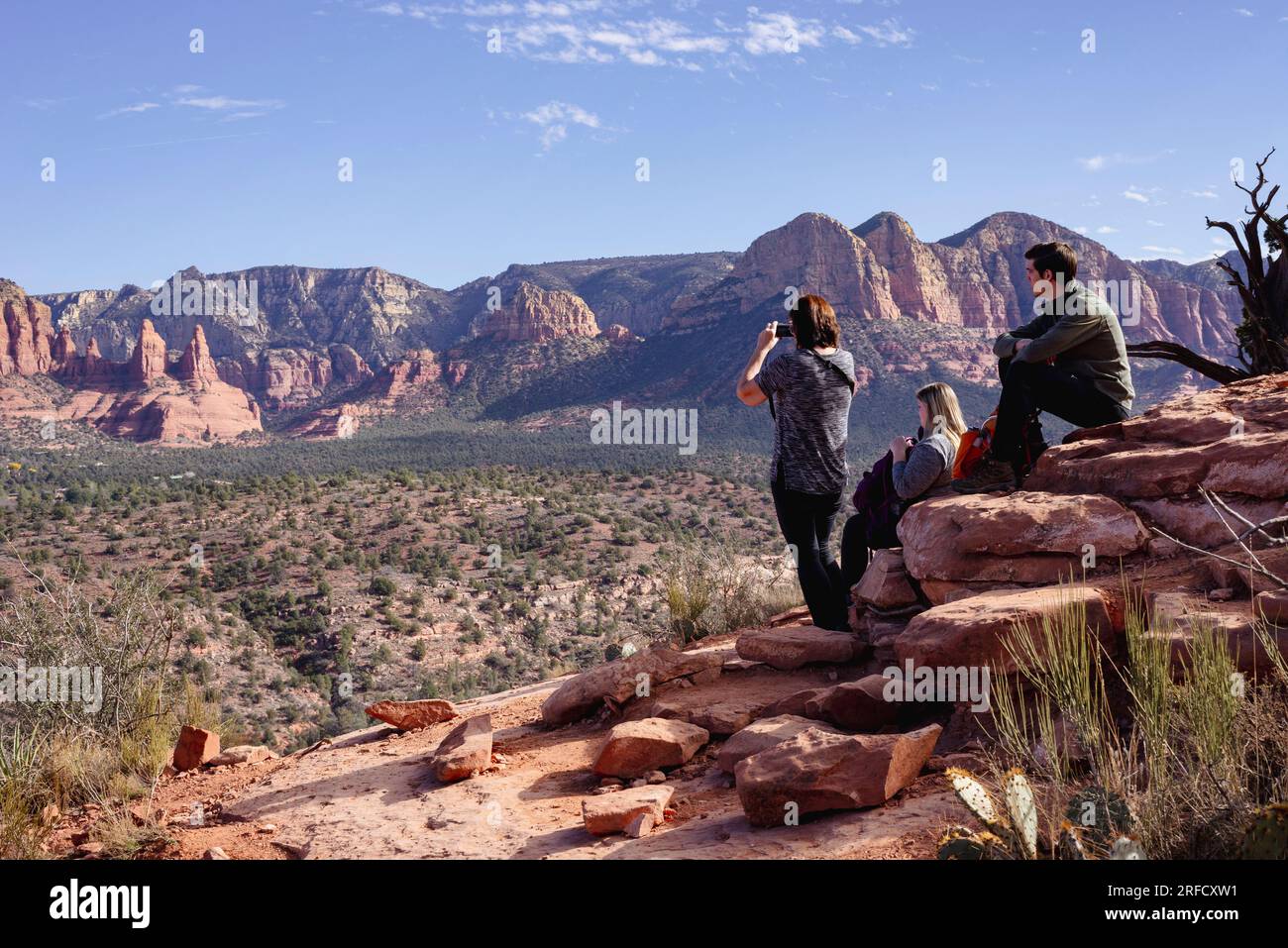 A family take a rest and enjoy the incredible views over the valley ...
