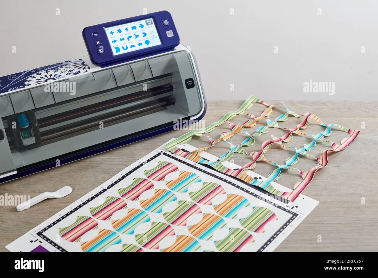 Home cutting machine and carved fabric details Stock Photo - Alamy