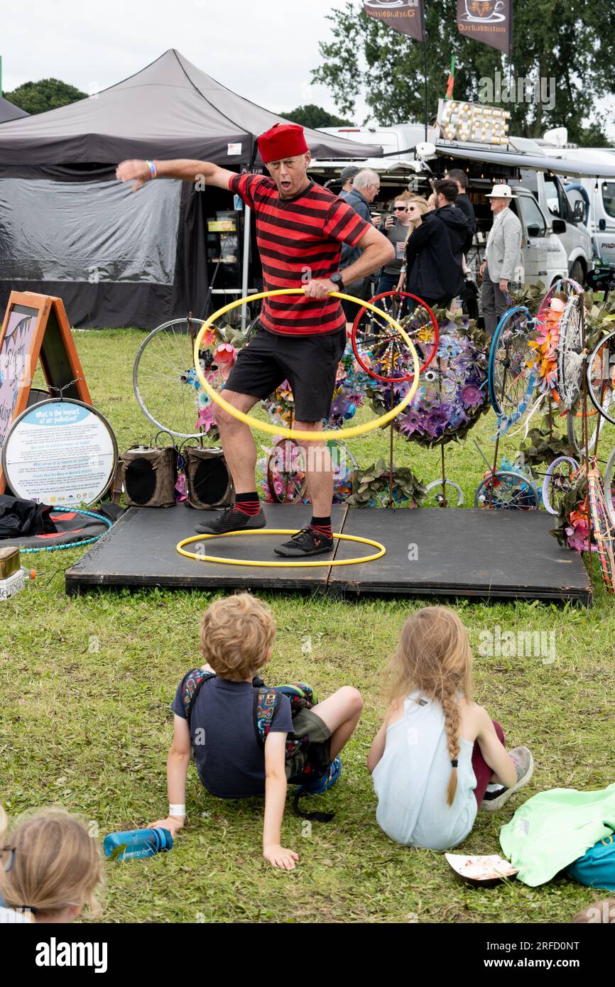Hula hoop children`s entertainer at Warwick Folk Festival, Warwickshire ...