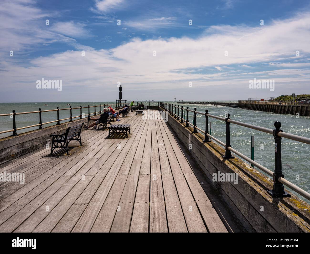 Littlehampton, West Sussex, UK, in summer; showing pier jutting out ...