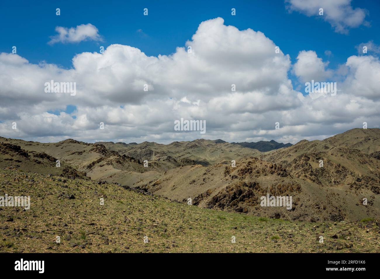 The rocky landscape at the Khavtsgait Petroglyphs dating from between ...