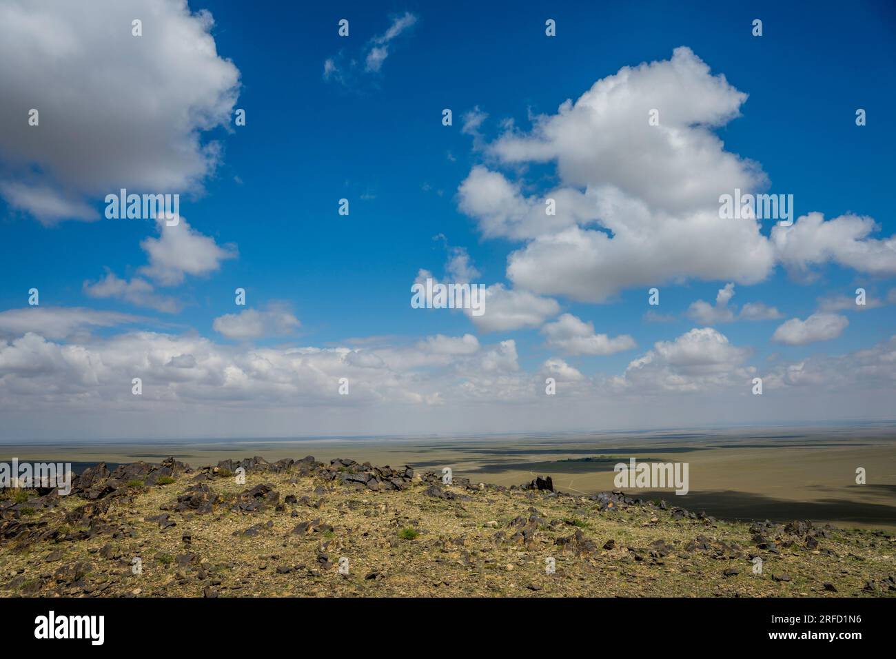The rocky landscape at the Khavtsgait Petroglyphs dating from between ...