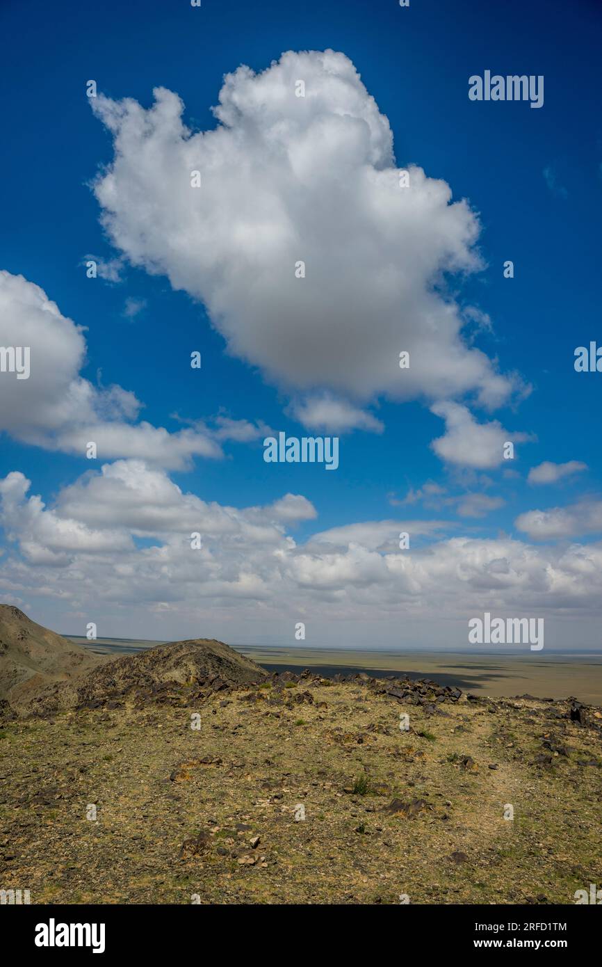 The rocky landscape at the Khavtsgait Petroglyphs dating from between ...