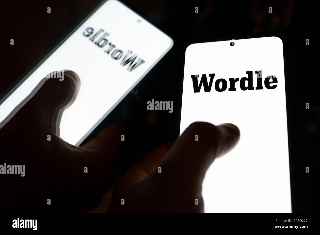 In this photo illustration a Wordle logo seen displayed on a smartphone ...
