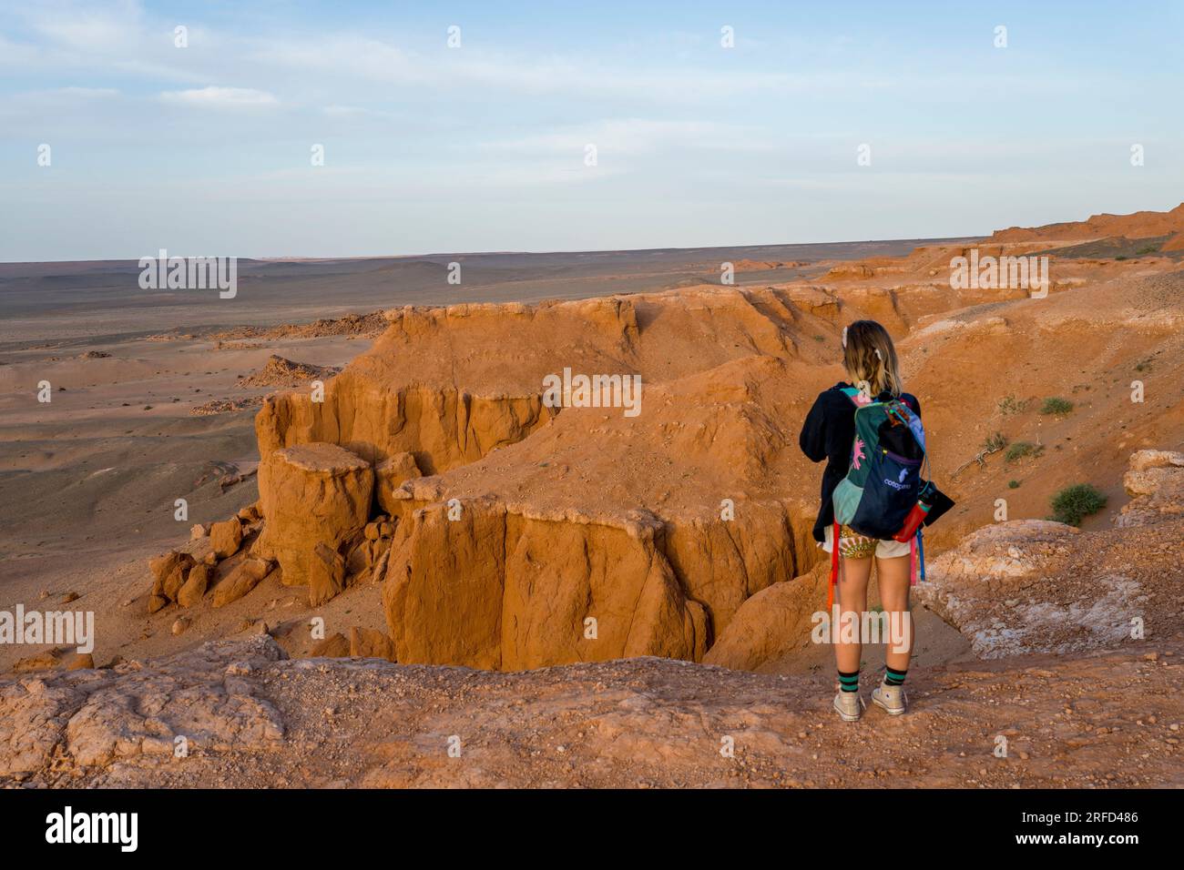 Tourist at the Flaming Cliffs in the Gobi Desert near Bulgan in ...