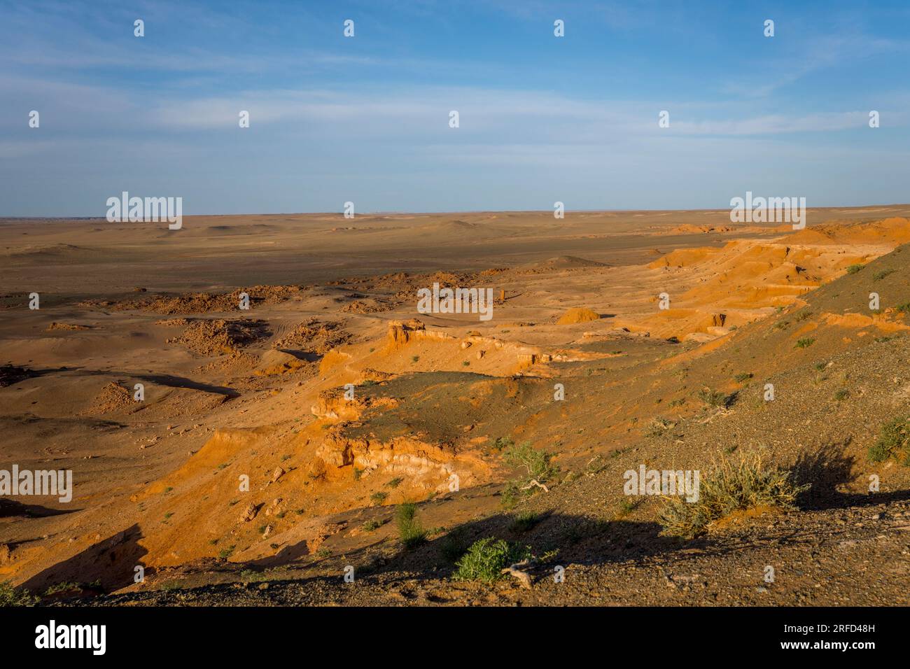 The orange rocks of Bayan Zag, commonly known as the Flaming Cliffs in ...