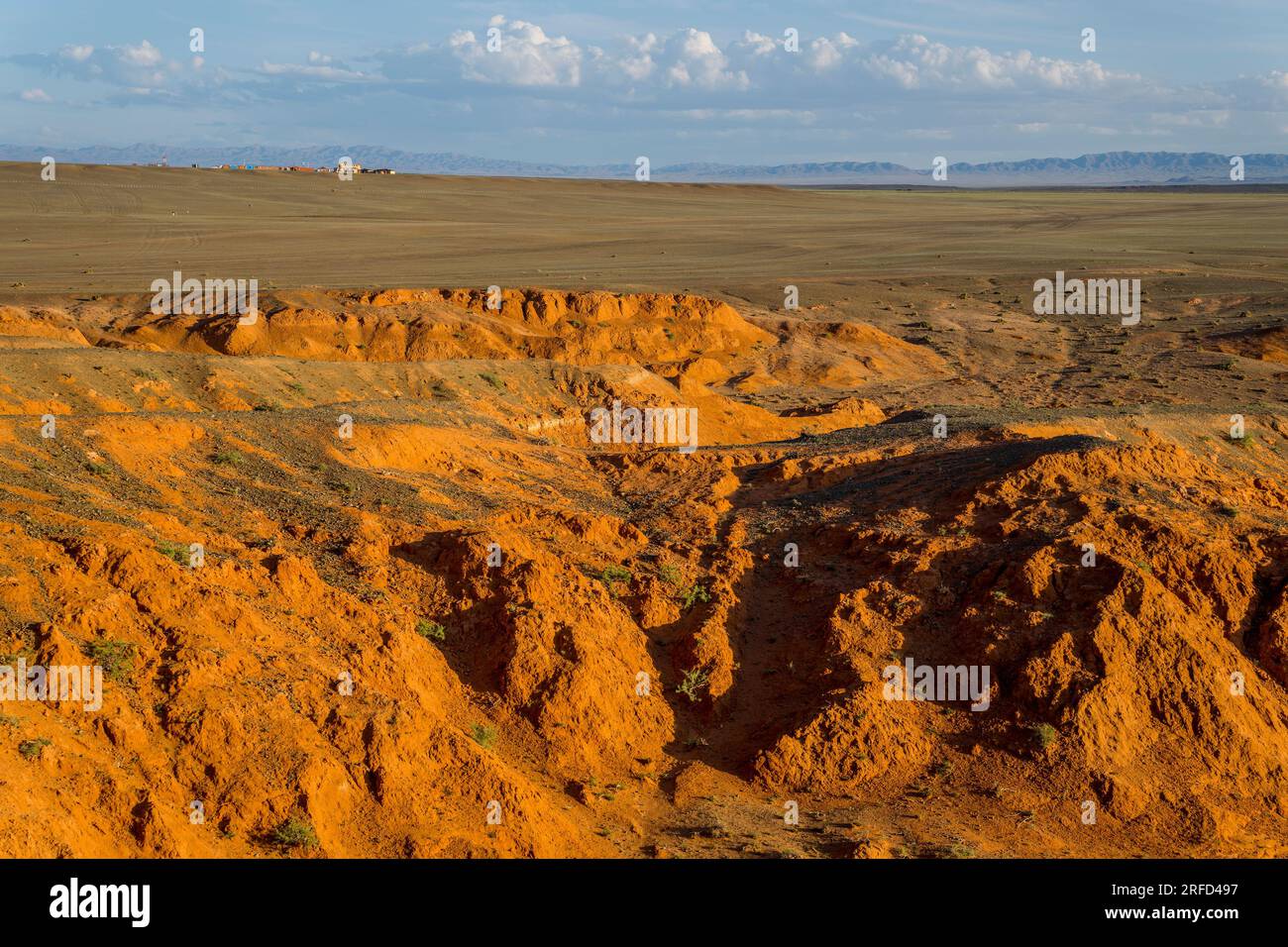 The orange rocks of Bayan Zag, commonly known as the Flaming Cliffs in ...