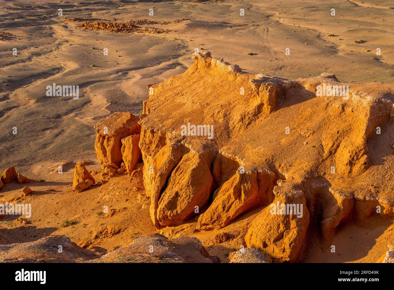 The orange rocks of Bayan Zag, commonly known as the Flaming Cliffs in ...