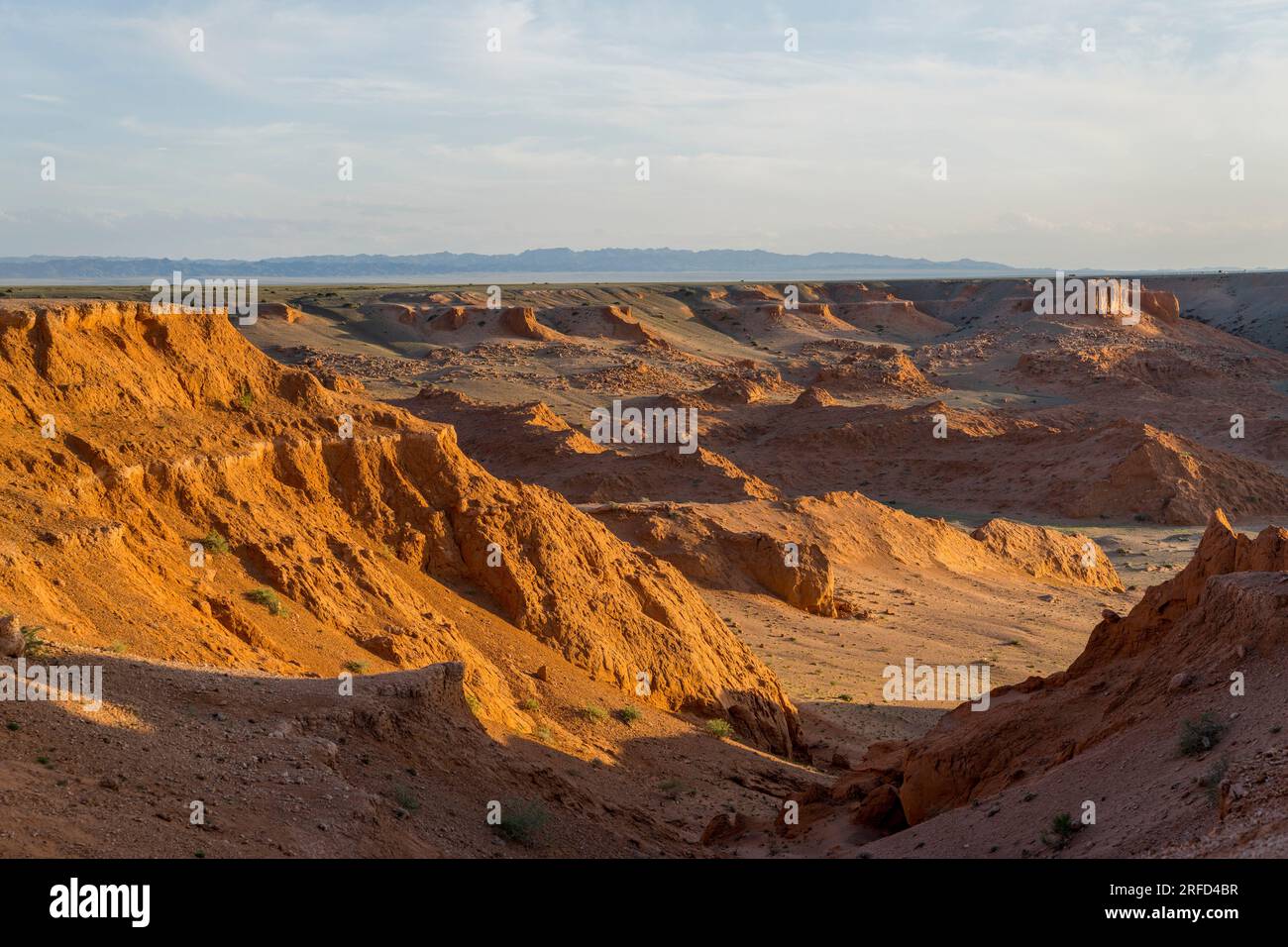 The orange rocks of Bayan Zag, commonly known as the Flaming Cliffs in ...