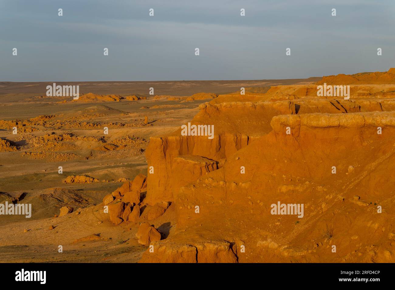 The orange rocks of Bayan Zag, commonly known as the Flaming Cliffs in ...