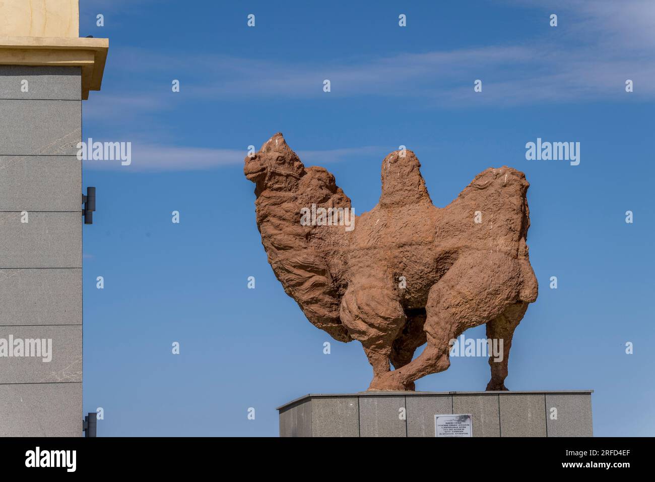 A Bactrian camel statue at the welcoming gate of Munugov province near ...
