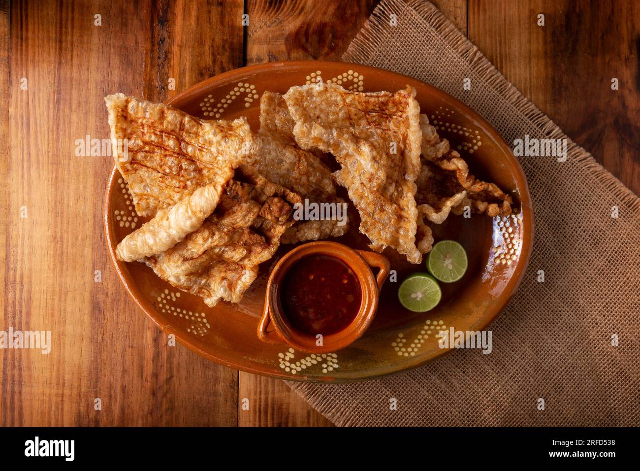 Chicharron. Crispy Fried pork rind, are pieces of aired and fried pork ...