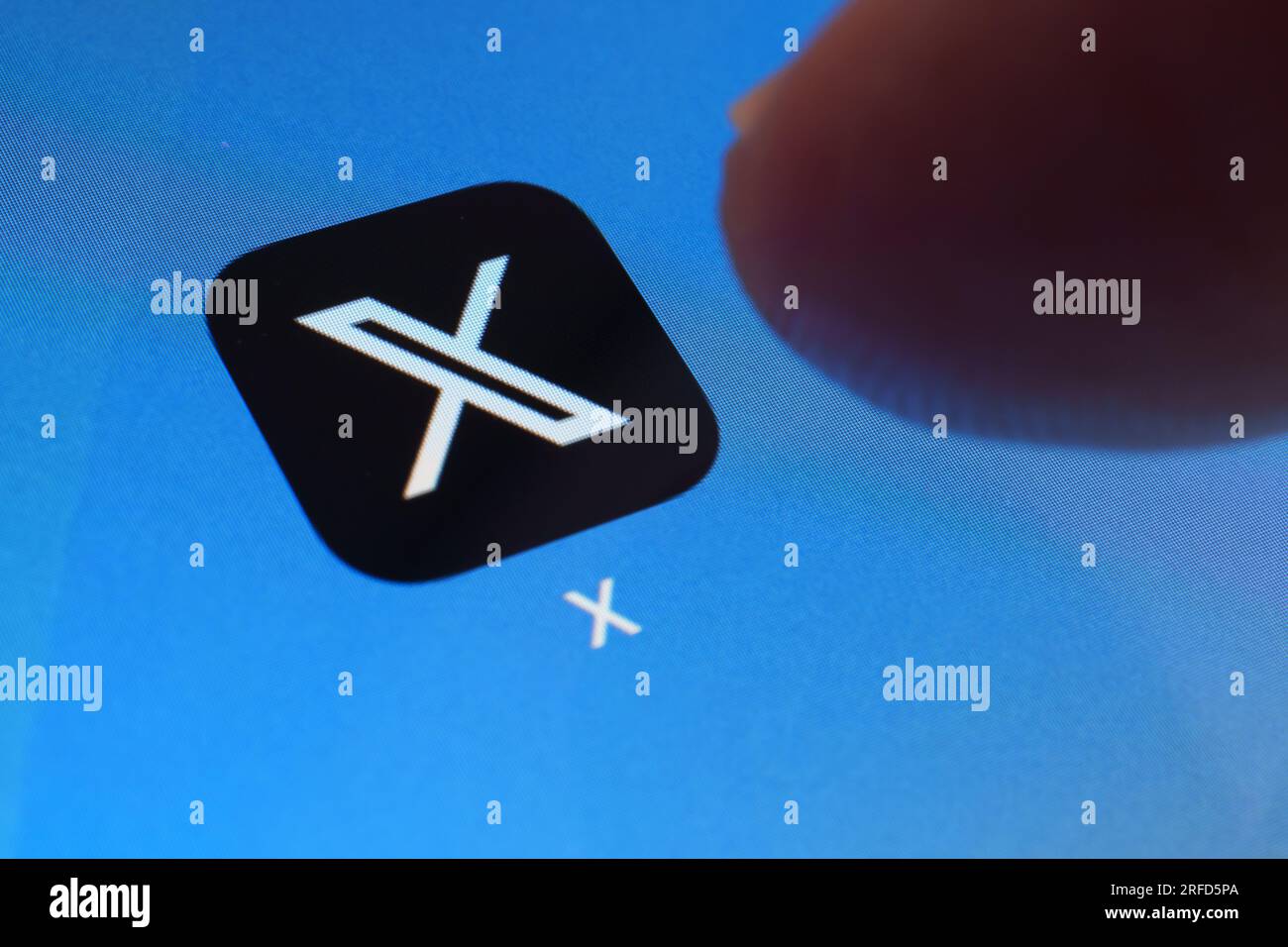 Twitter X app logo seen on screen of smartphone. Twitter rebrands as X ...