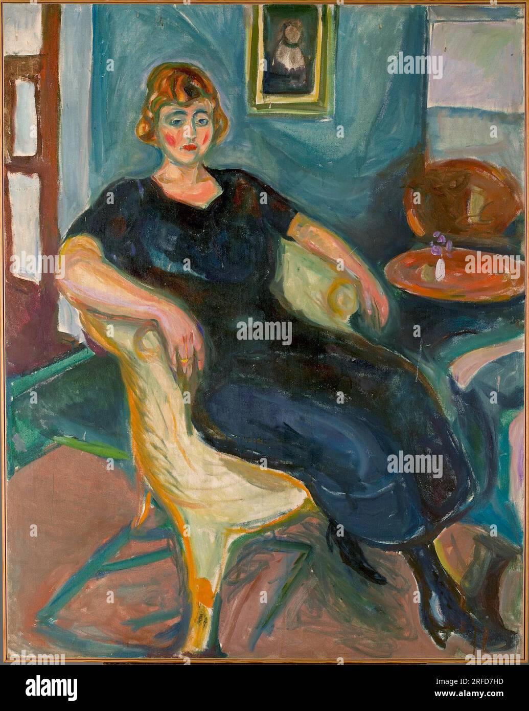 Model by wicker chair hi-res stock photography and images - Alamy